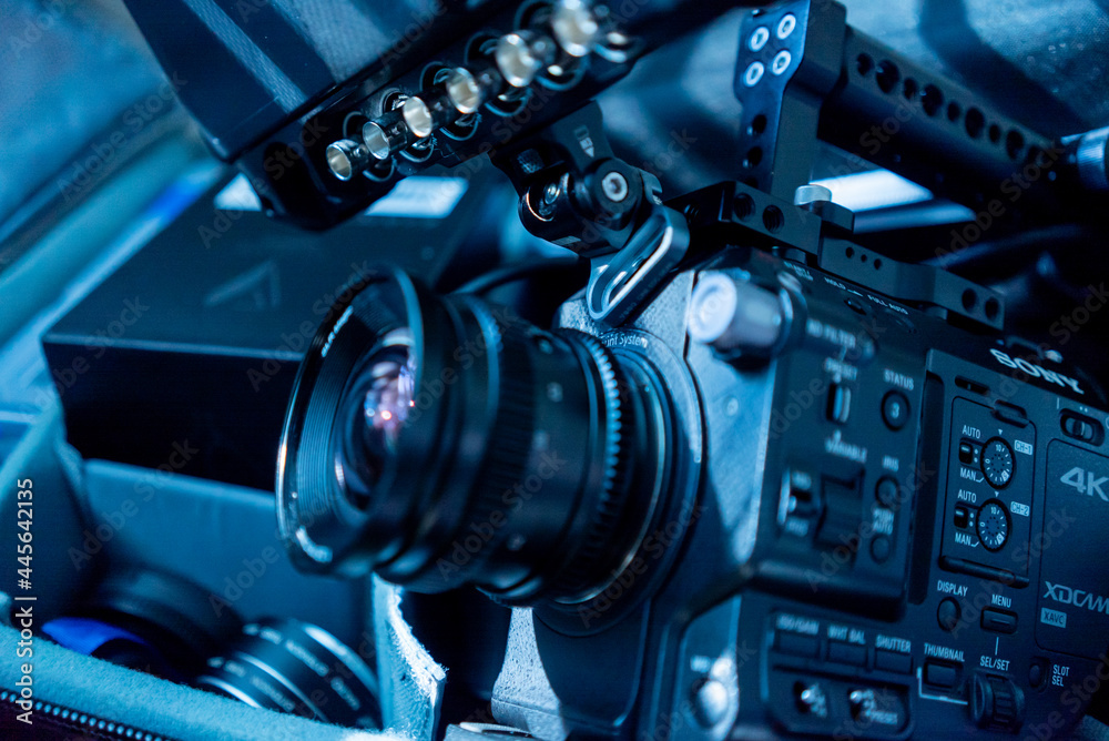 Angled soft focus dream like image of cinema camera rig with small ...