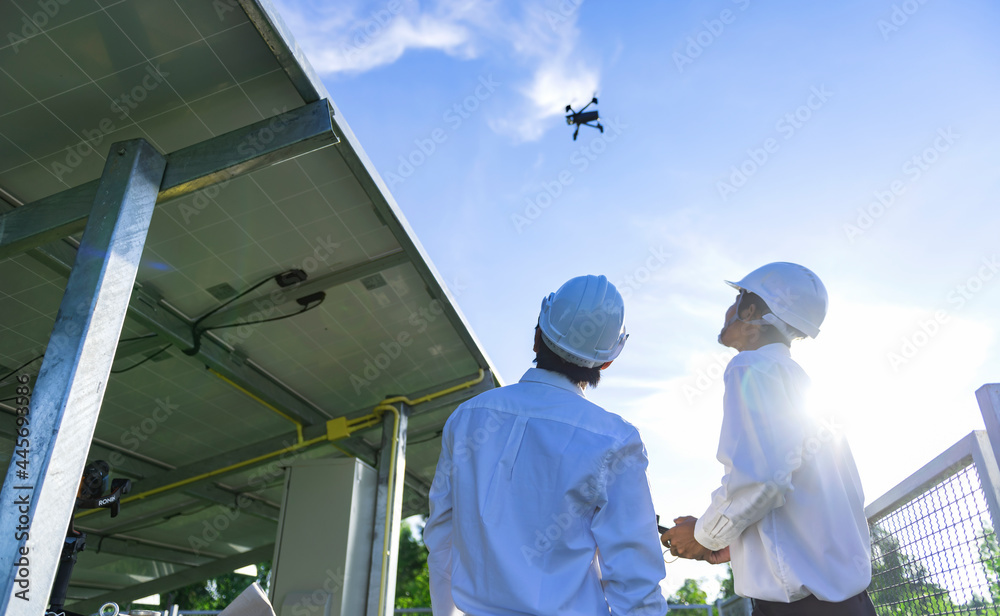 Engineer inspect and checking solar panel by Drone at solar power plant ...