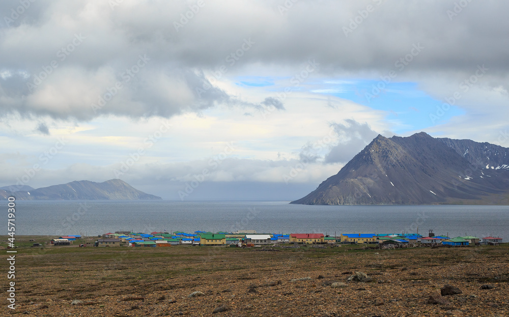 View of the Arctic Eskimo settlement in the tundra on the shore of a ...