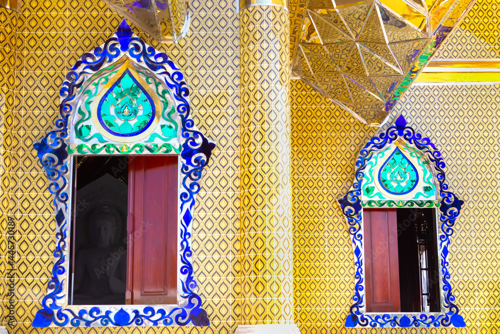 The windows of the Thai temple churches are decorated with stained ...