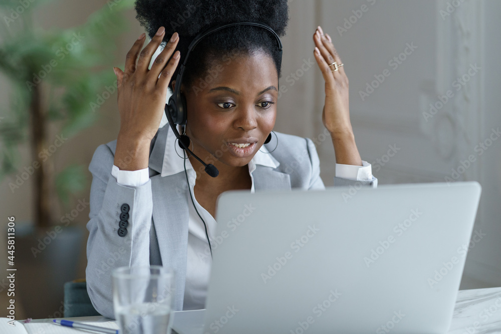 Frustrated businesswoman in headset talk to client in call center ...