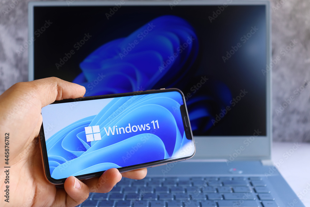 New Microsoft Windows 11 logo on computer screen and Windows 11 logo is ...