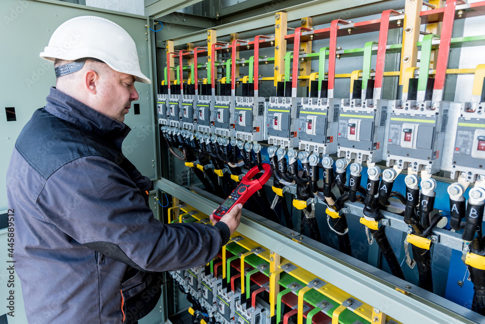 Checking the operating voltage levels of the solar panel switchgear ...