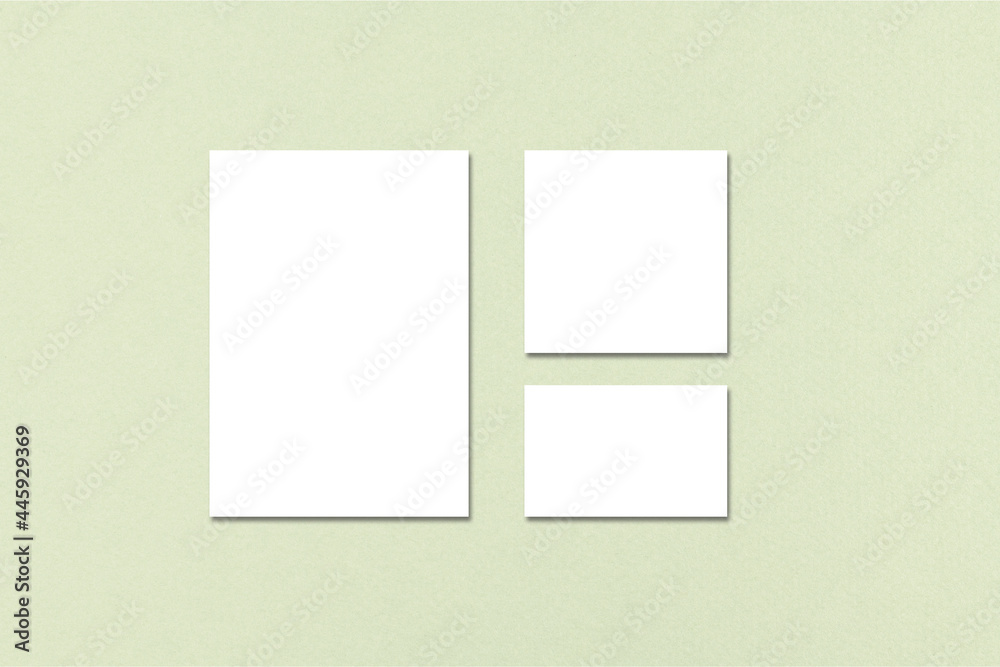 empty white vertical a4 poster and one square sized and one horizontal ...