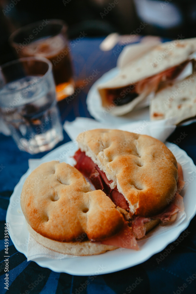 Traditional Italian food. Crispy panini and piadina sandwiches with ...