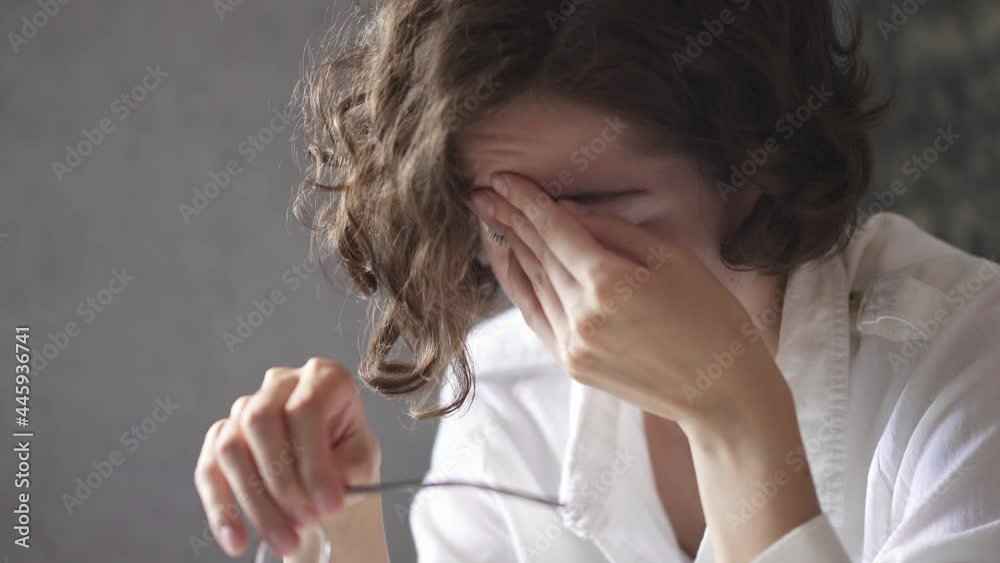 Frustrated young woman is experiencing severe depression. Depressed ...