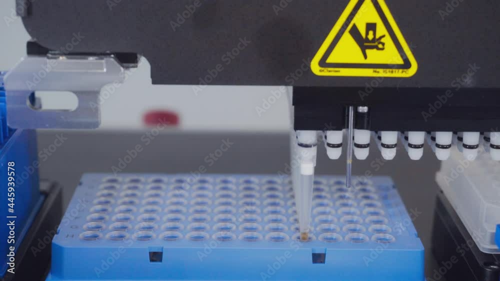 Automation in the clinical laboratory. Pipetting robot laboratory ...