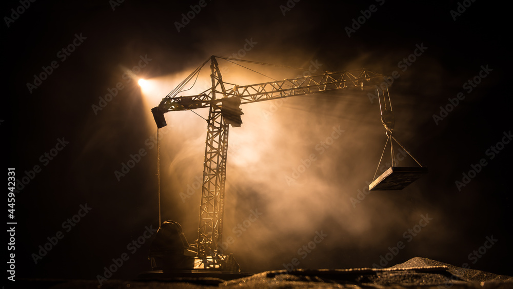 Abstract Industrial background with construction crane silhouette over ...