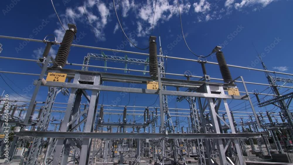 Motion past stand with insulators on electricity production substation ...
