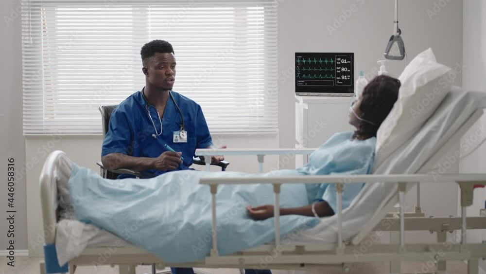 In the Hospital, african american beautiful doctor checking on woman ...