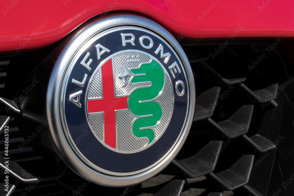 Alfa Romeo logo. The logo shows a red cross, and the biscione, a ...