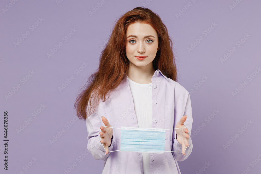 Beautiful cute young redhead curly woman 20s wear white T-shirt violet ...