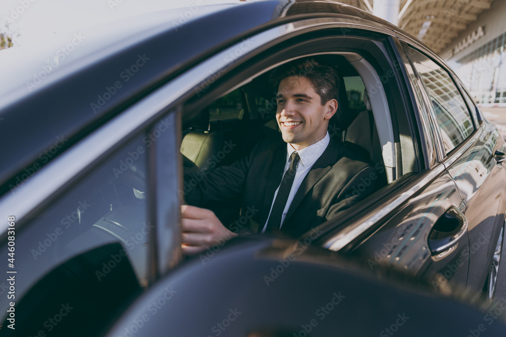 Side profile view smiling young driver smiling businessman man 20s wear ...