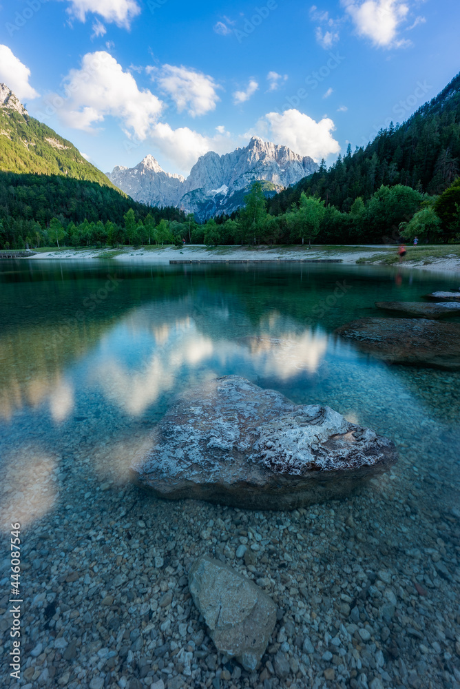 Lake Jasna (Jezero Jasna) sunset on a summer day near Krajnska Gora and ...