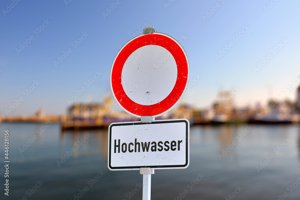 German water flood sign with red circle and text saying 'Hochwasser ...