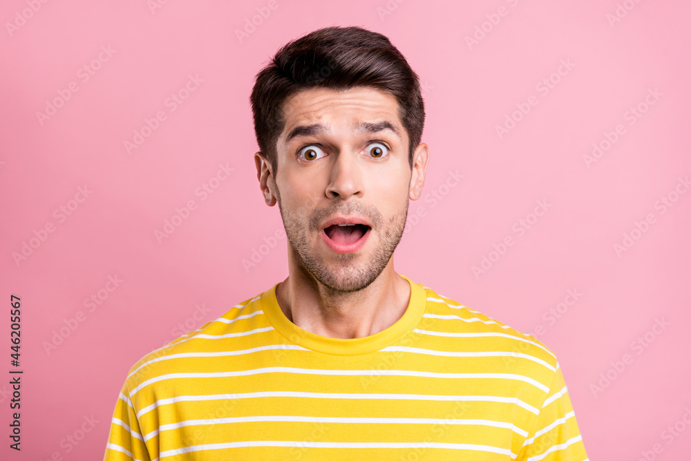 Portrait of attractive cheerful amazed worried guy staring eyes sudden ...