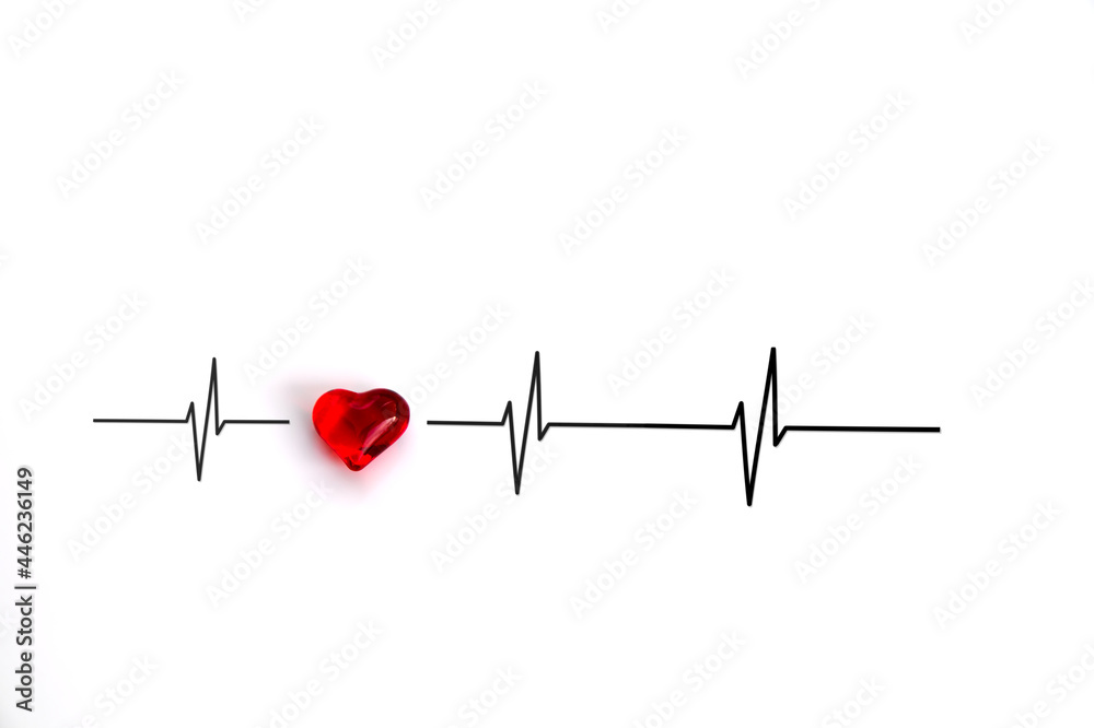 Light-reflecting, red heart of glass with curves of cardiac cycles or ...