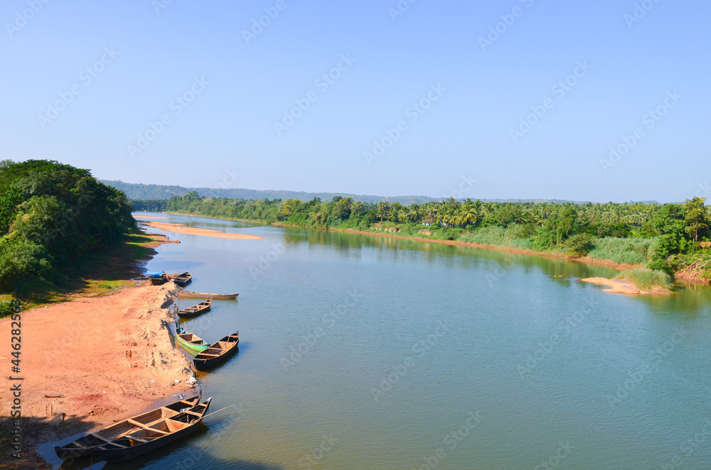 Picturesque view of Phalguni River with hills and fields in the ...