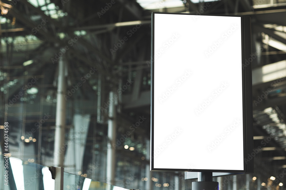 Blank screen advertise mockup in the airport terminal. Display for ...