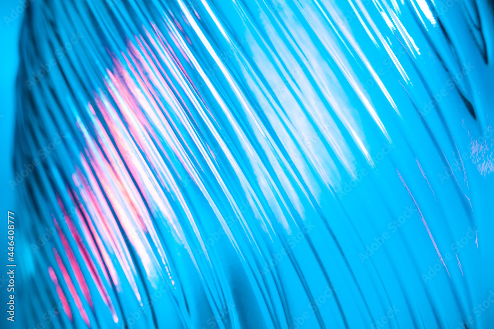 Abstract glass background. Texture of wavy glass illuminated with multi ...