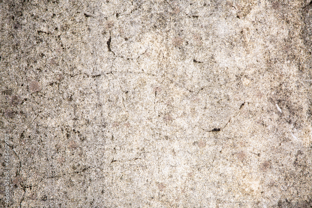 Aged concrete wall with scratches, black points and plaster. Background ...