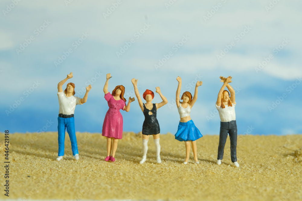 Miniature tiny people toys photography. Group of teens raised hand or ...