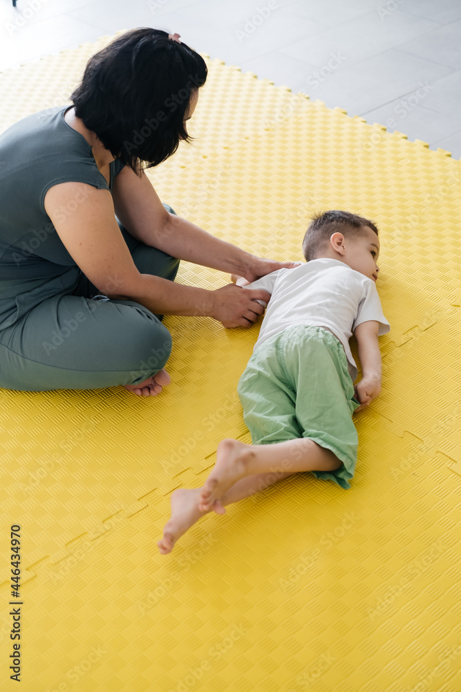 Rehabilitation of child with cerebral palsy in special center. Mother ...
