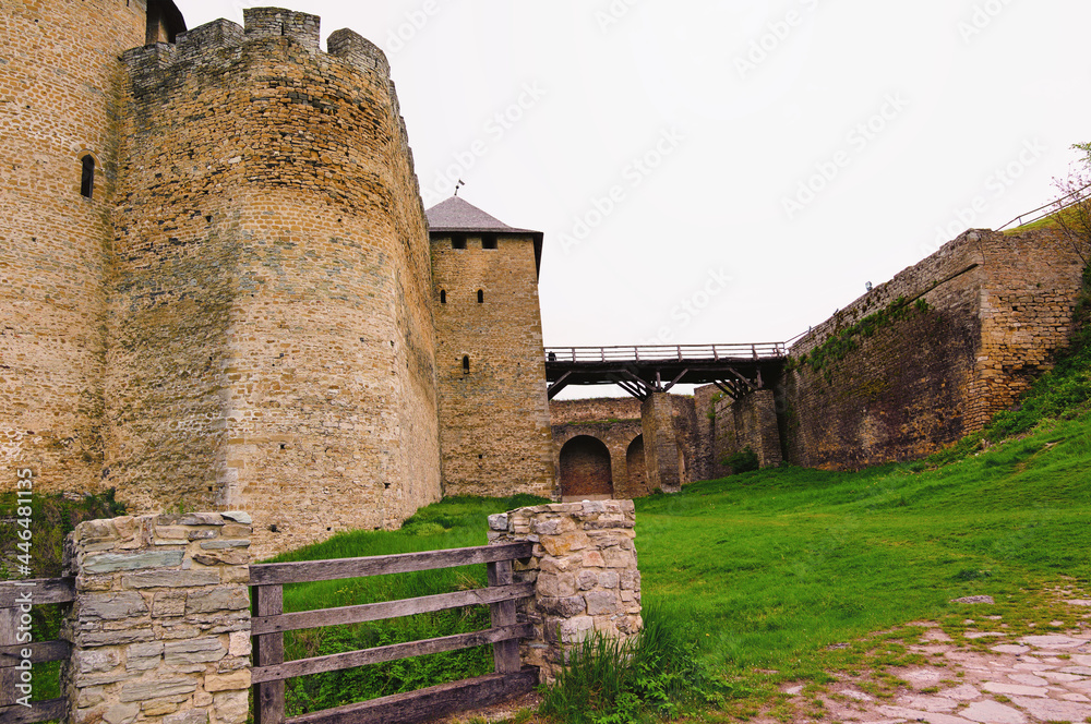 Picturesque landscape view of old bridge to the main gate of medieval ...