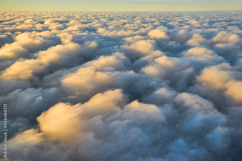 View of the beautiful sky and clouds from the window of the airplane ...