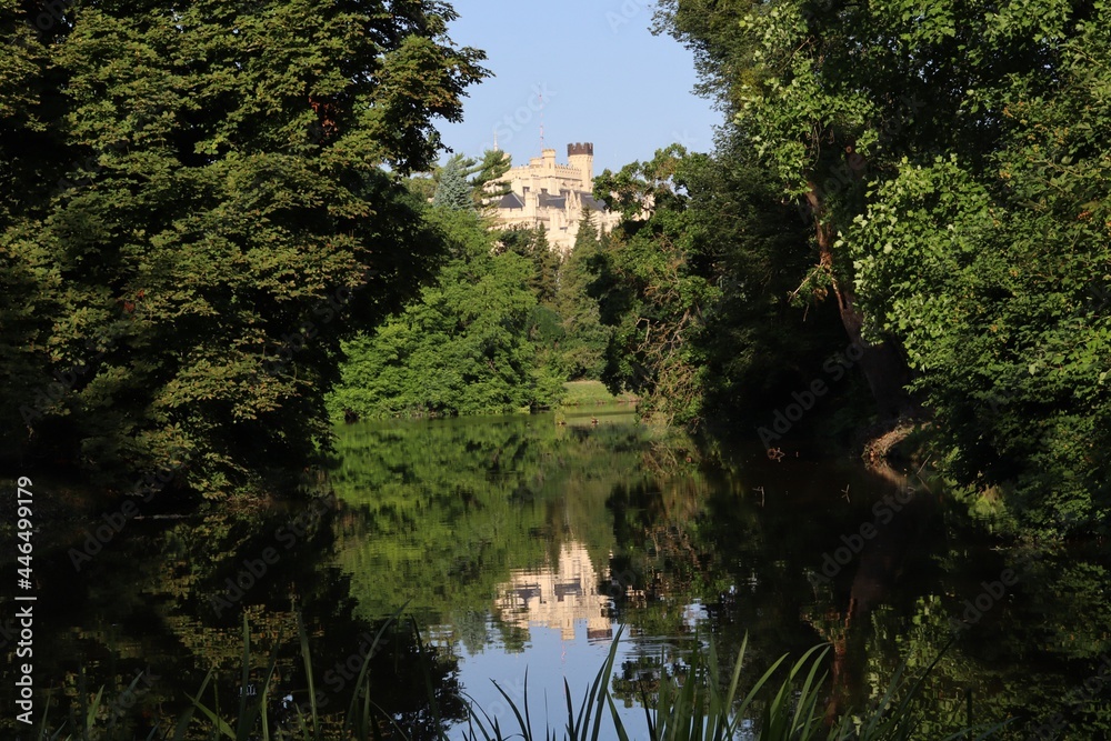 Reflection of a castle on the surface of a pond. Lednice-Valtice area ...