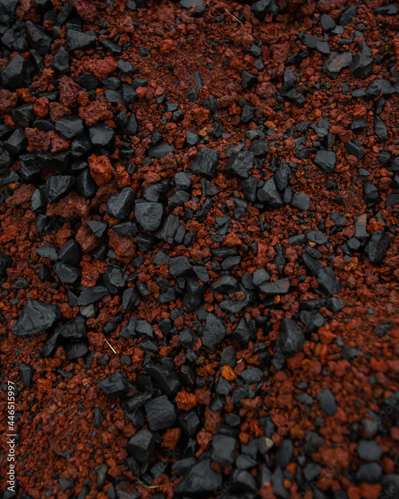 Textura de piedra volcánica roja y negra Stock Photo | Adobe Stock