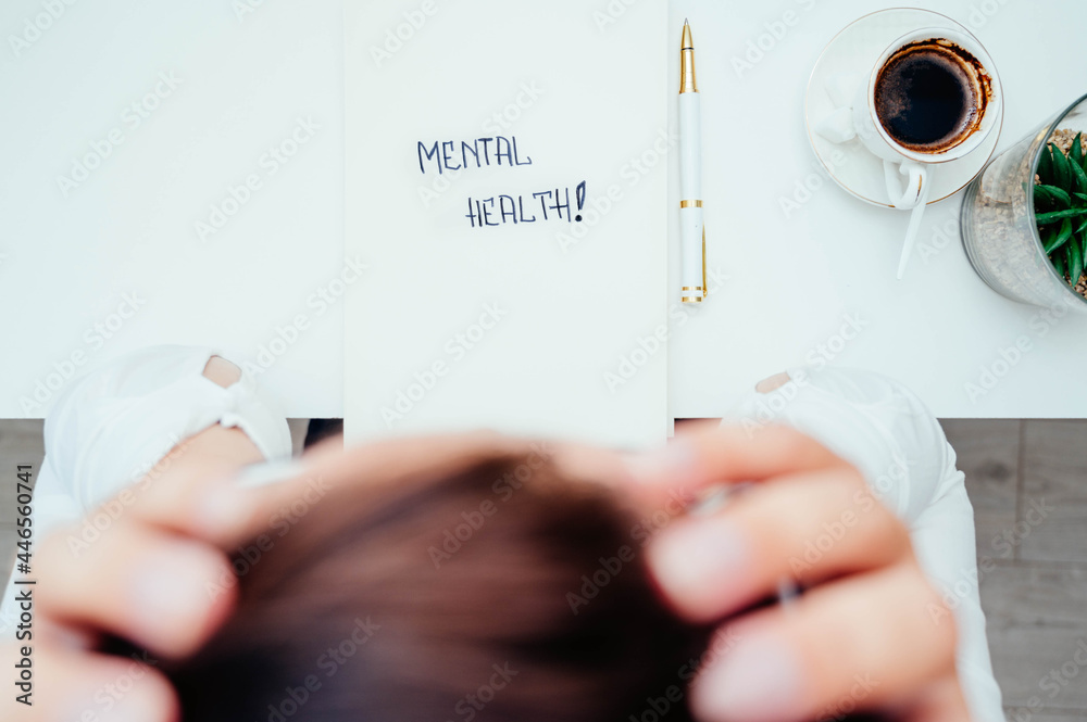 Exhausted female worker sitting at office desk, tired woman employee ...