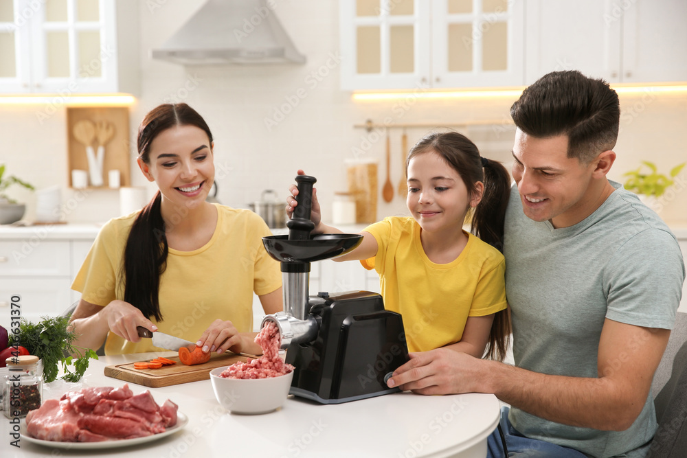 Happy family making dinner together in kitchen, father and daughter ...