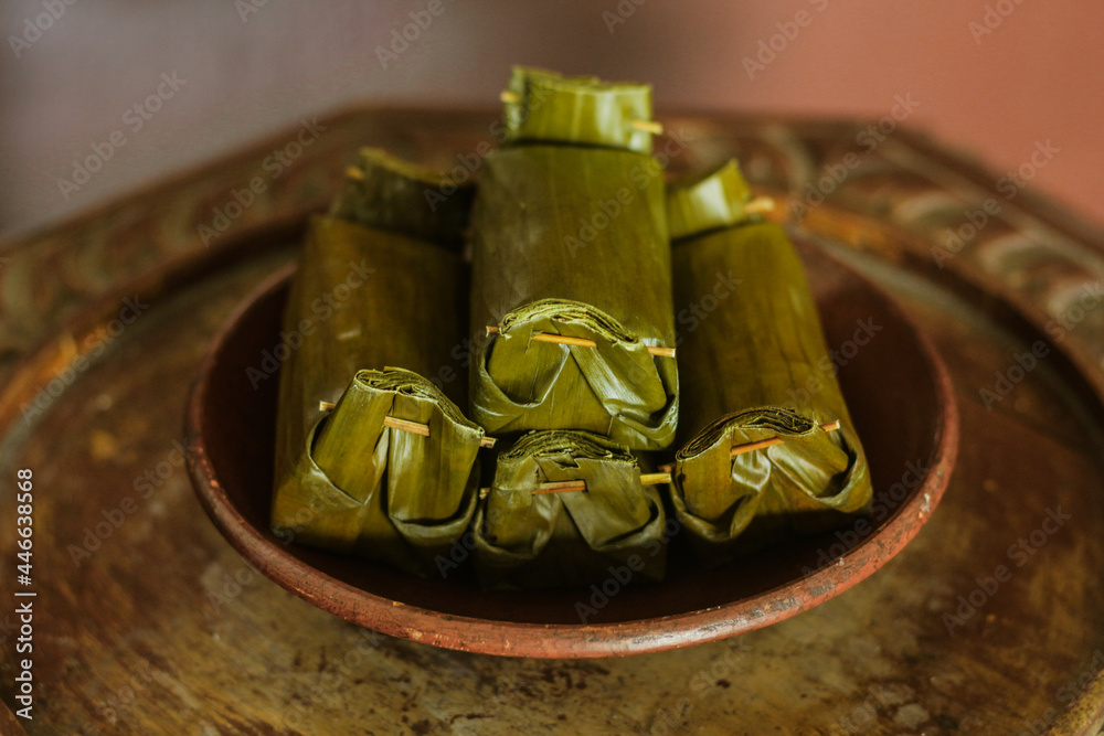 arem-arem is traditional food from java. is rice cake filled with spicy ...