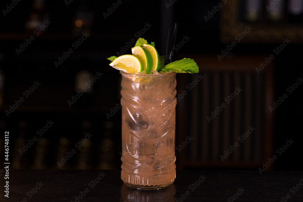 Zombie cocktail on a bar counter in a nightclub Stock Photo | Adobe Stock
