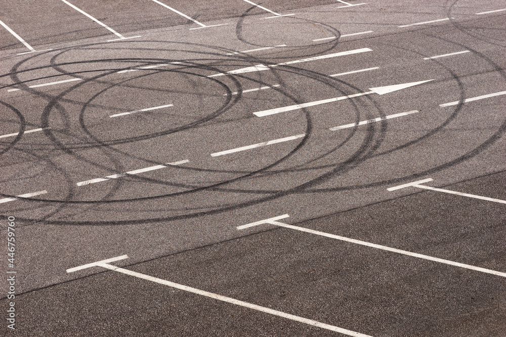 Burned tire marks in the parking lot. Donut tire tracks Stock Photo ...