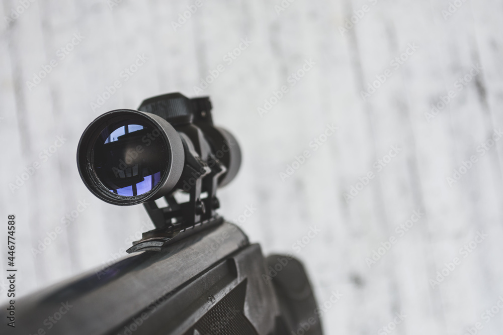 air rifle with an optical sight on a light background Stock Photo ...