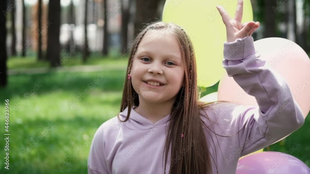 pretty girl tween teenager in purple costume having fun playing with ...