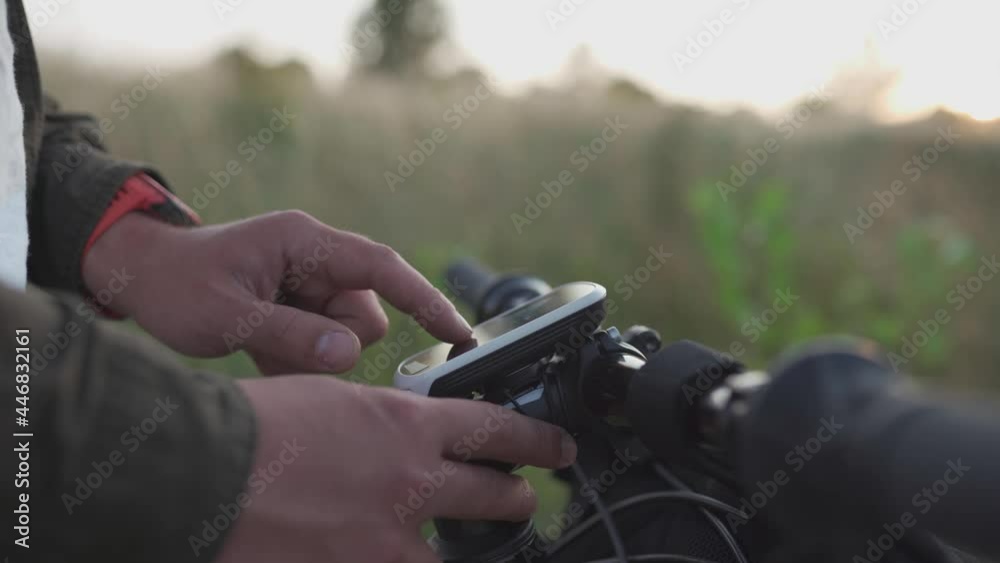 People, sports, active lifestyle concept. Cyclist using navigator ...