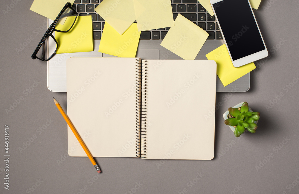 Top view photo of yellow sticky notes glasses smartphone on laptop ...