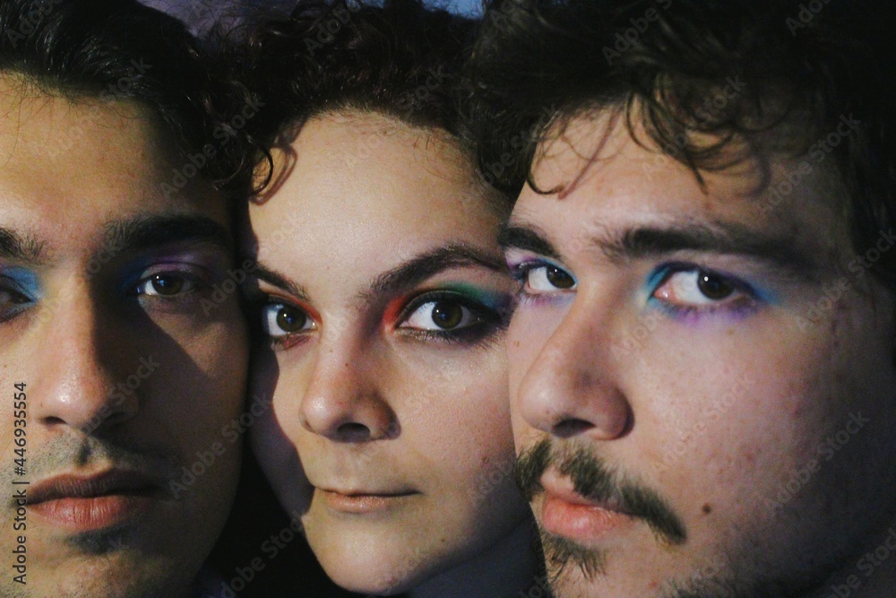 portrait of closeup faces of three lgbtq queer friends faces with ...