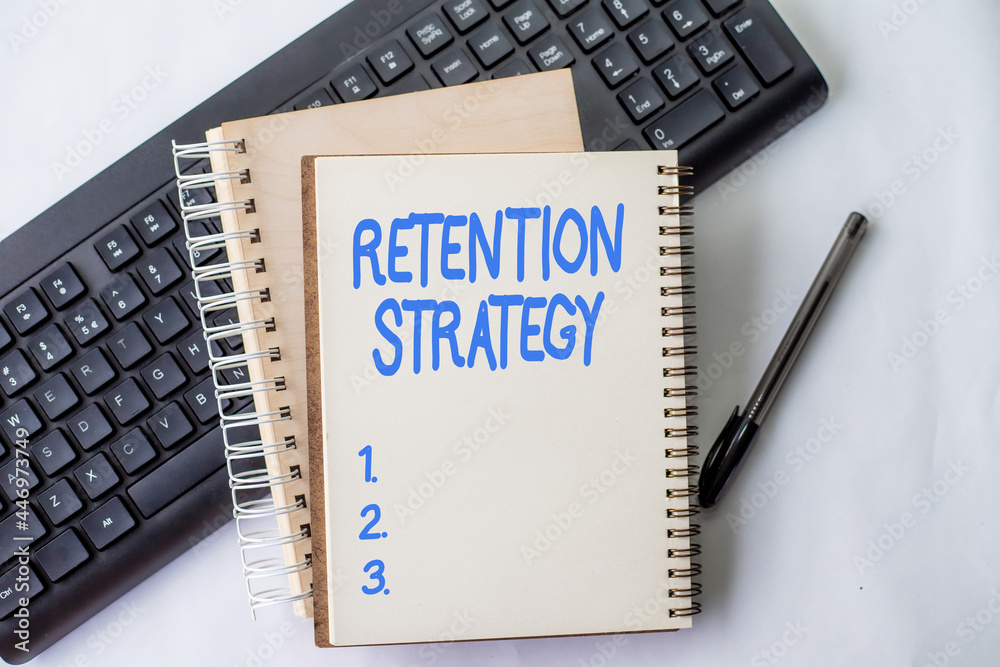 Sign displaying Retention Strategy. Business idea activities to reduce ...