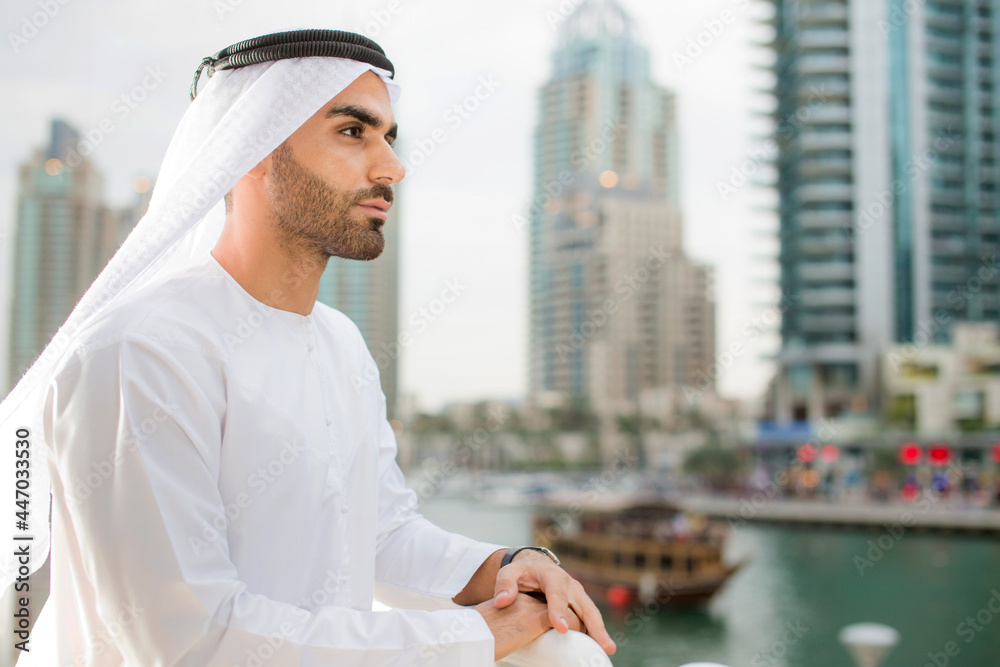 Arab Entrepreneur taking over the phone Stock Photo | Adobe Stock