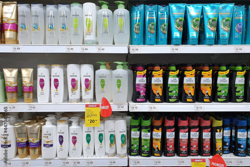 Various toiletries products display on store shelves in Giant ...