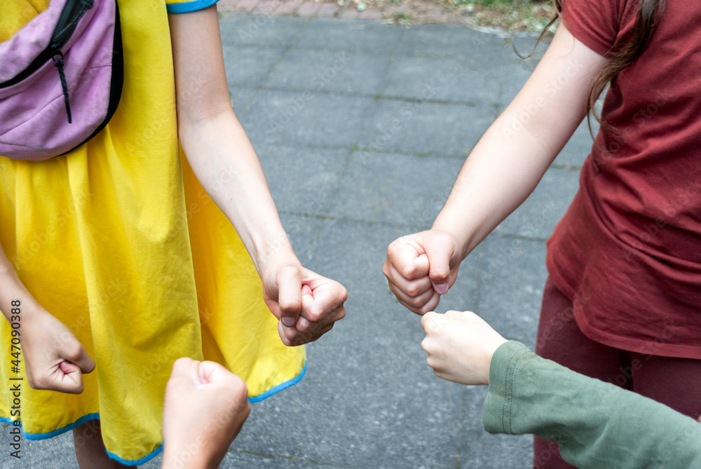 Children play with their hands outdoors Stock Photo | Adobe Stock