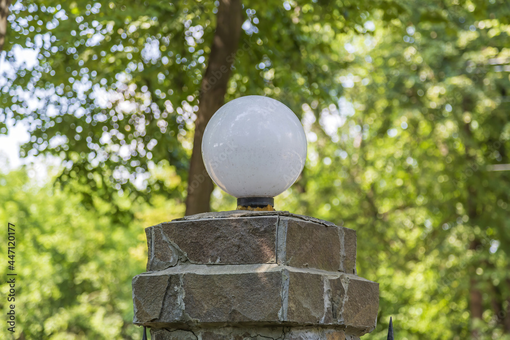 Large spherical electric lamp made of glass as an element of decoration ...