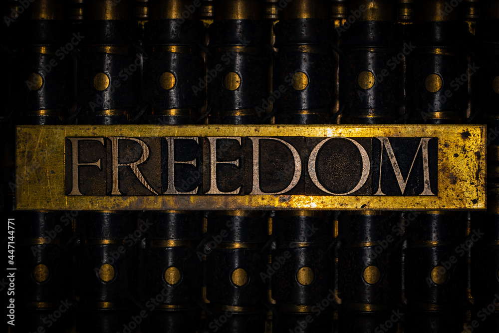 Freedom text on machine gun bullet casings Stock Illustration | Adobe Stock