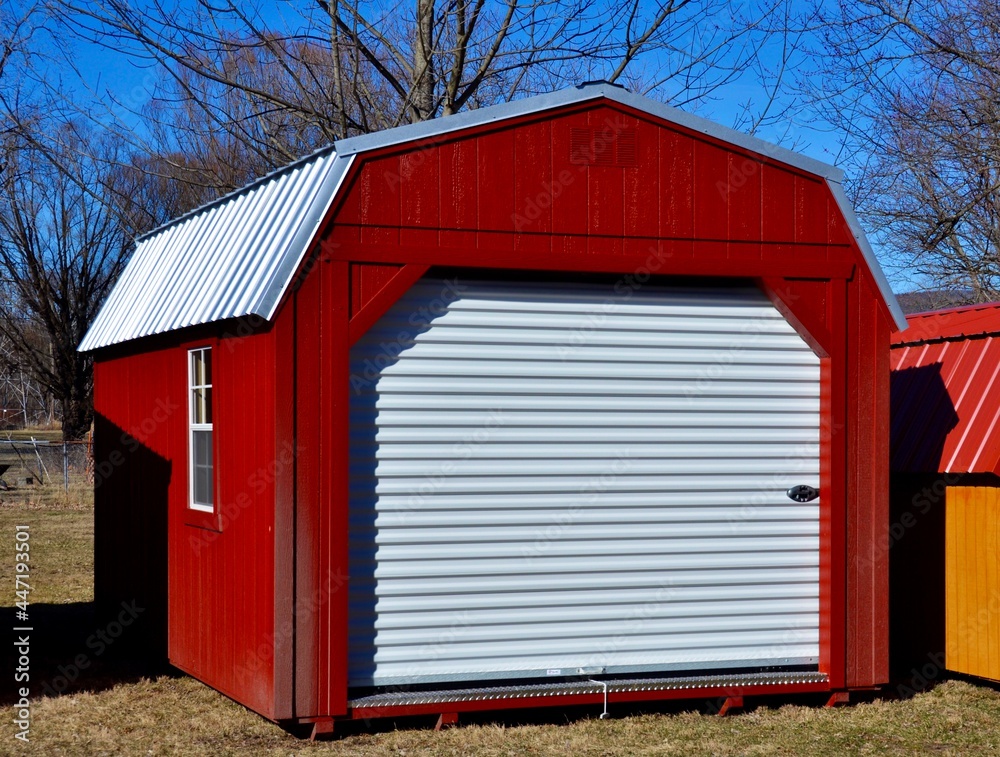 Red wooden shed, with sliding door. American shed is typically a simple ...