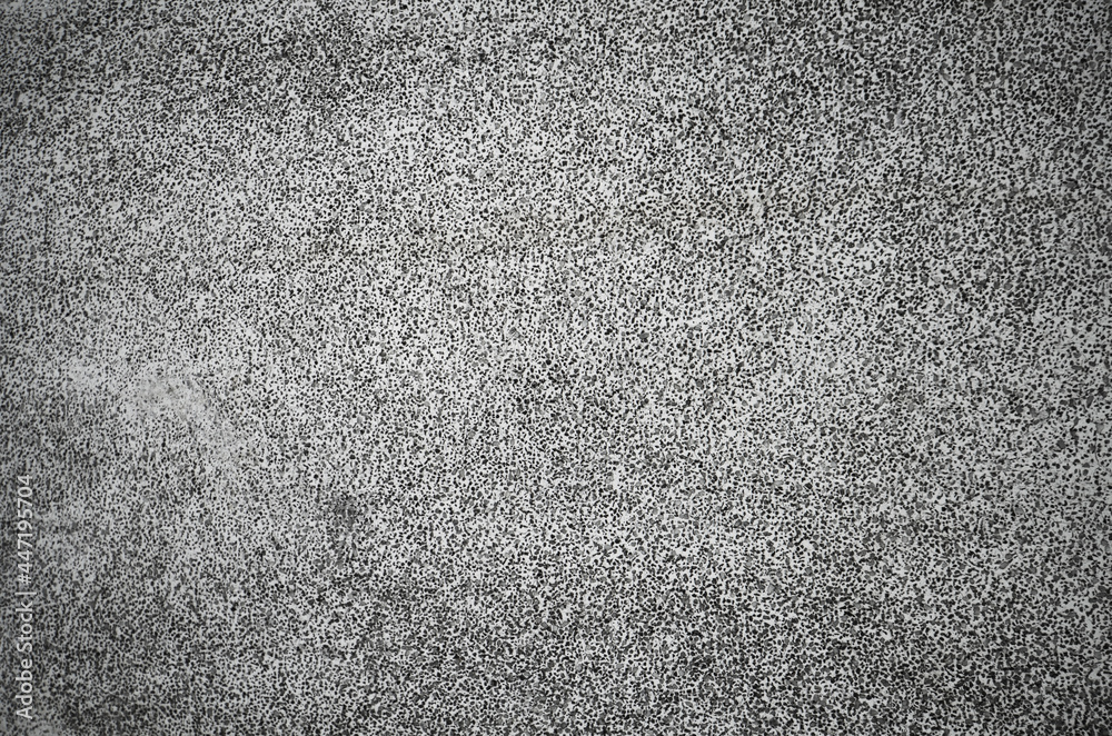 Dark gray sand wash texture background. Washed small sandstone of wall ...