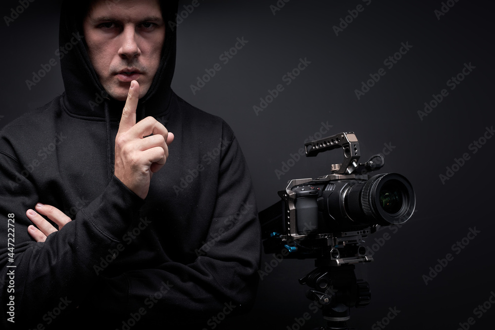 maniac filming victim on camera, watching, looking at camera, isolated ...